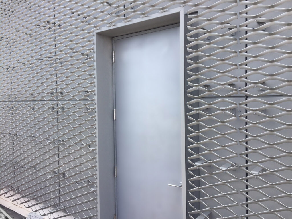 626 First Ave. Expanded Mesh Rooftop Equipment Screen