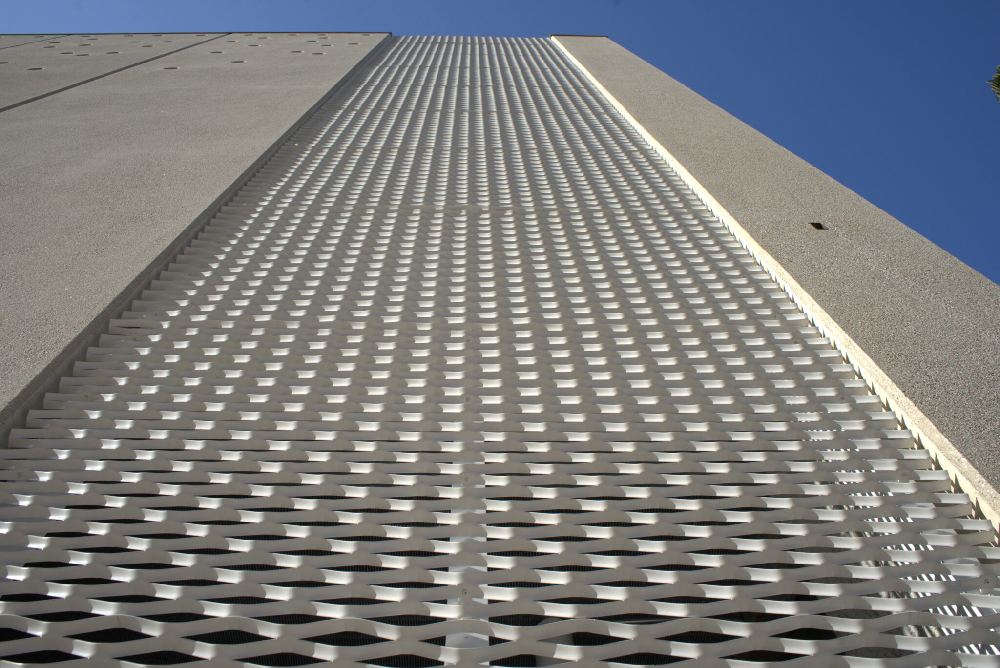 Convention Center Glass Façade with Expanded Mesh Sunshade and Glare ...