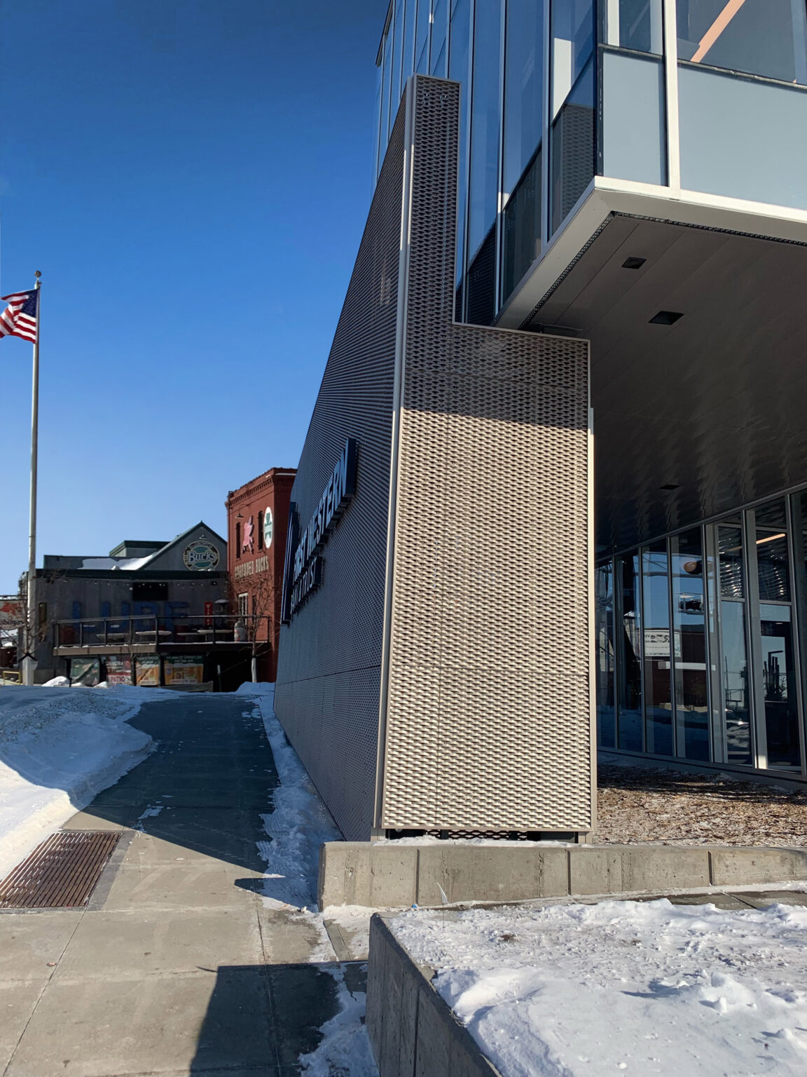 Expanded Mesh Façade, Signage, and Feature Wall