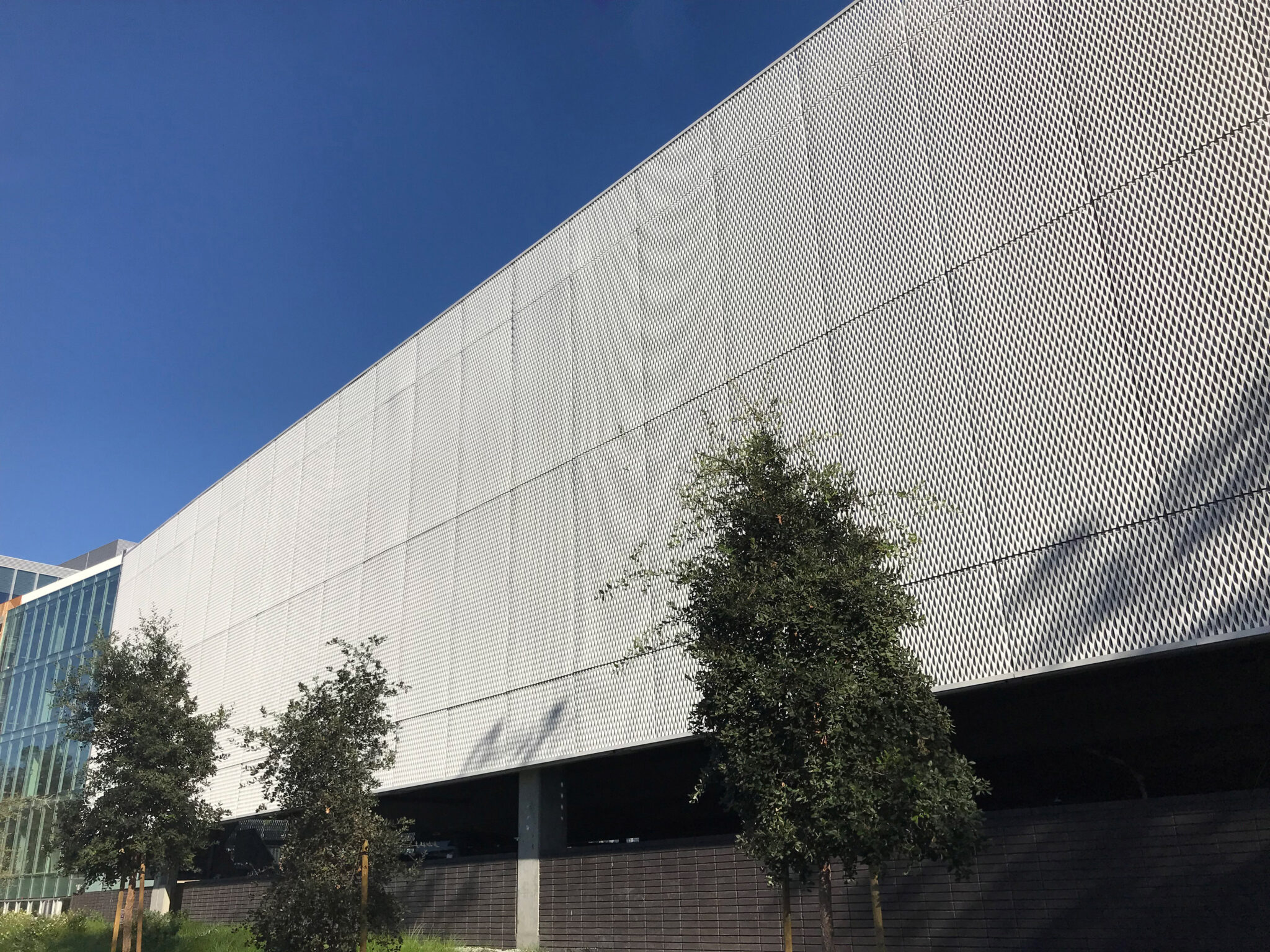 Parking Garage Cladding - Expanded Mesh, Perf, and Laser Cut Panels